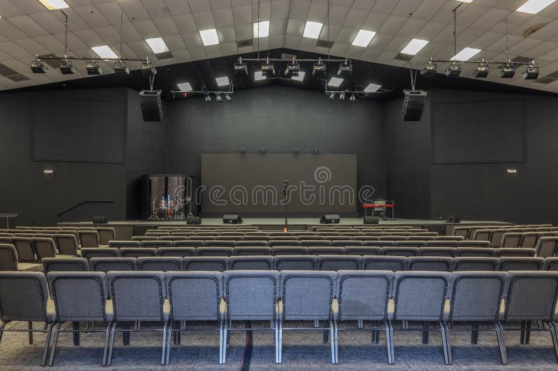 Empty Auditorium with Stage and Rows of Chairs Stock Photo - Image of ...