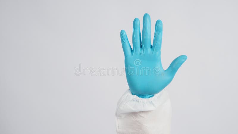 Hand with PPE Suite and Hand is Holding Blood Test Tubes and Wearing ...