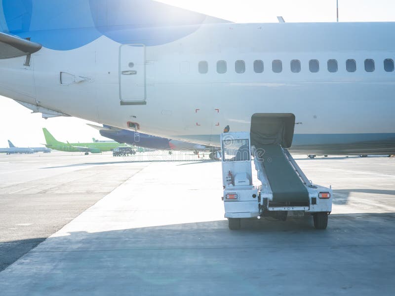 Empty Baggage Carousel at the Plane. Stock Photo - Image of plane ...