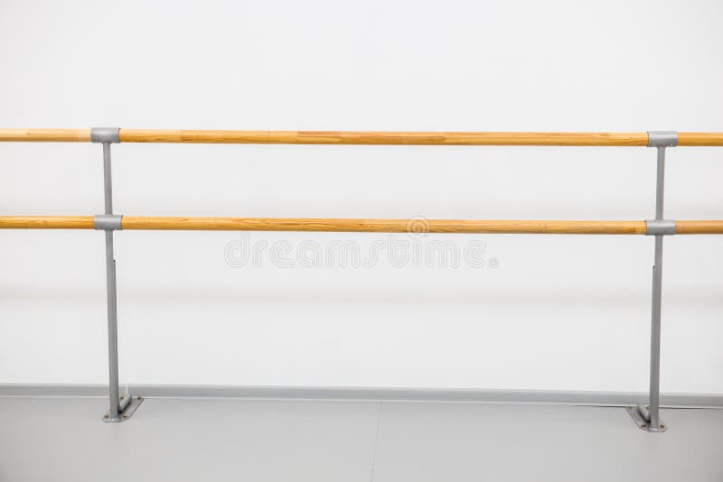 An Empty Ballet Class, White Walls, and a Light Wood Bar Stock Photo ...