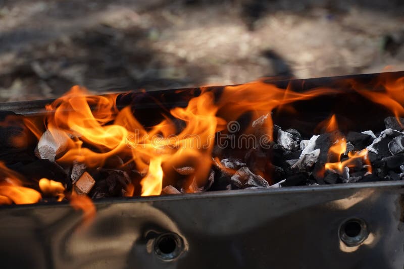 Empty Barbecue Flaming Grill Close Up with Bright Flames and White ...