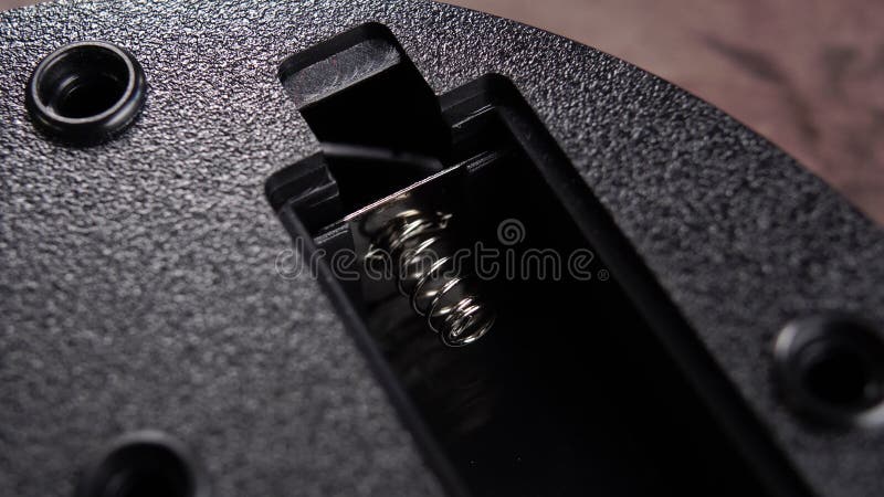 Empty Battery Compartment of a Black Plastic Electronic Device with a ...