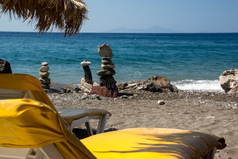 Empty Beach Bed with View at Sea Stock Photo - Image of sand, stones ...