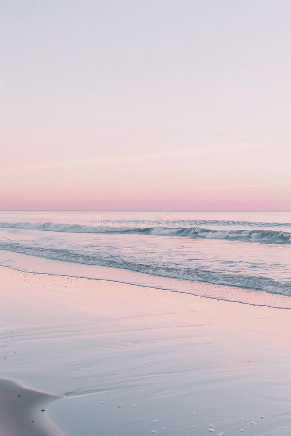 An Empty Beach with the Ocean in the Background at Sunset Stock ...