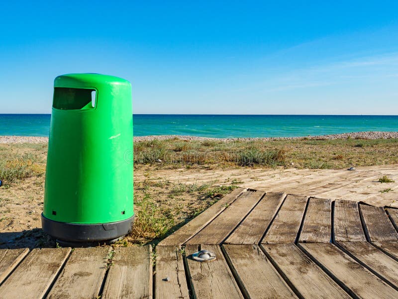 Empty beach with trash can stock photo. Image of clean - 183928210