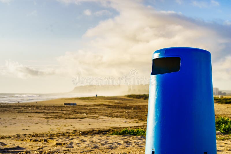 Empty beach with trash can stock photo. Image of container - 328295994