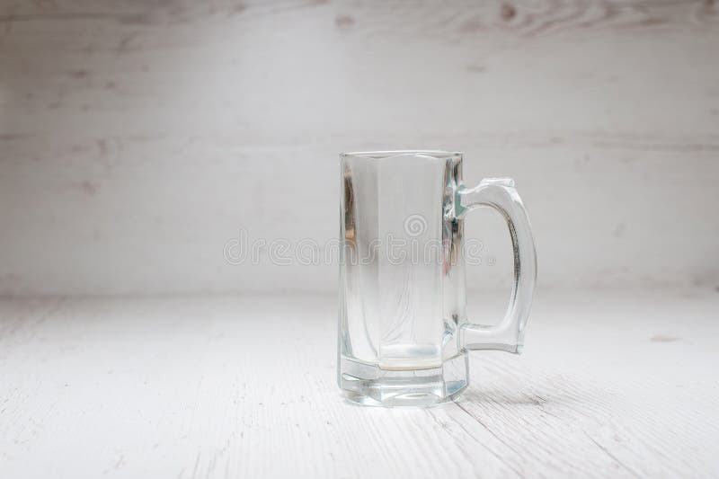 Empty Beer Mug on a Light Background Stock Image - Image of drops, copy ...