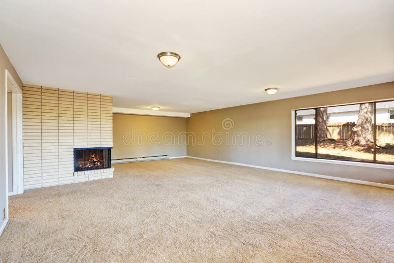 Empty Room With Window And Carpet