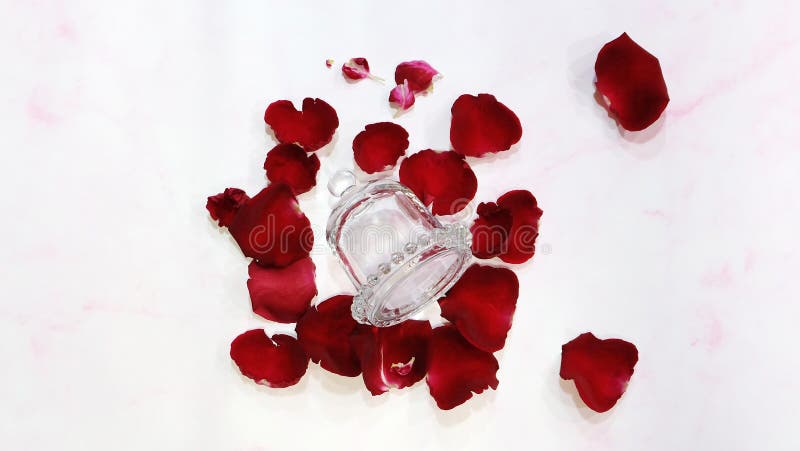 An Empty Glass Jar with Red Rose Petals Stock Image - Image of magic ...