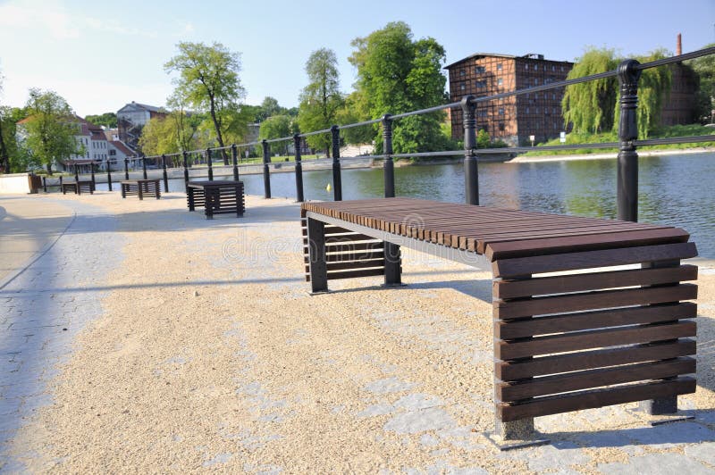 Empty Bench Along River in the City. Stock Image - Image of bench ...
