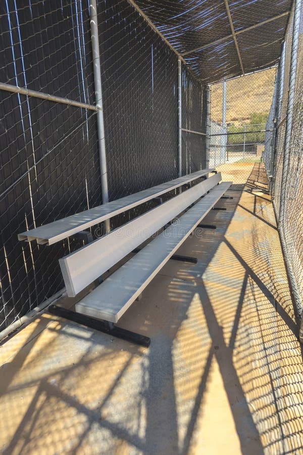 Empty Bench in Baseball and Softball Dugout Stock Photo - Image of ...