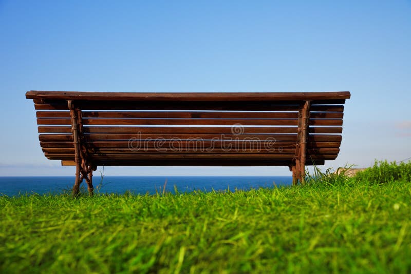 Empty Bench Facing Sea stock image. Image of bright, vertical - 24759853