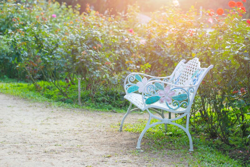 Bench in the Flower Garden Green Park. Stock Image - Image of retire ...