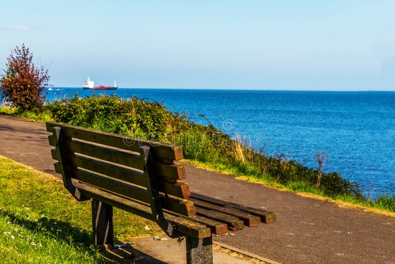 Empty Bench on the Ocean Bay, View on the Horizon, Ship Stock Photo ...