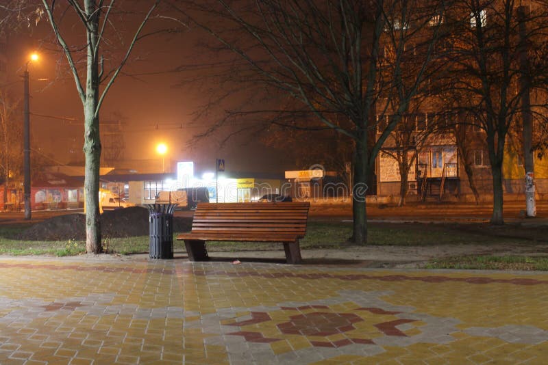 Empty bench in the park stock photo. Image of lanterns - 164688194