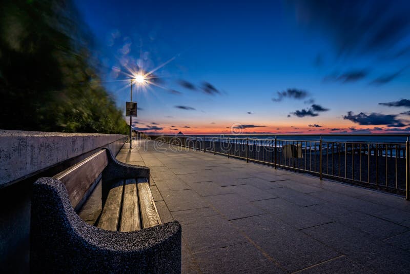 Bench on a Promenade at Sunset Stock Photo - Image of idyllic ...