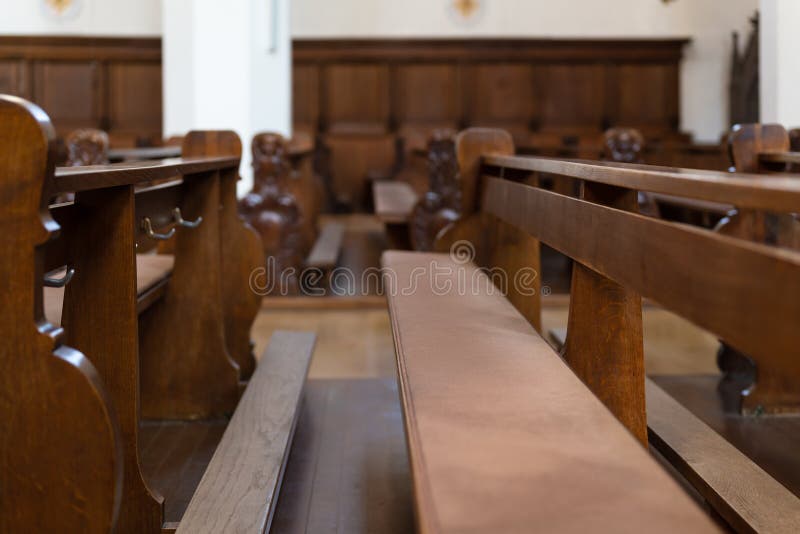 Empty Benches in a Church with a Clothes Hook Stock Photo - Image of ...