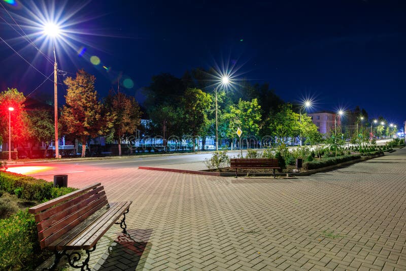 Empty Benches on the Night Street. Background with Selective Focus and ...