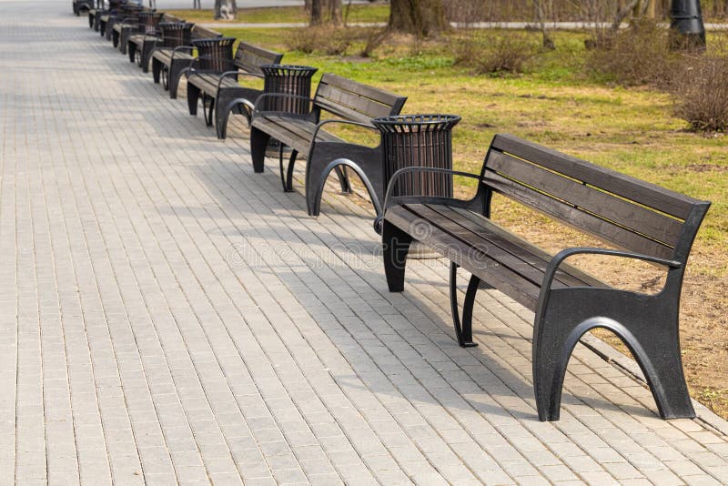 Empty Benches in a Summer Park Stand in a Row Stock Image - Image of ...
