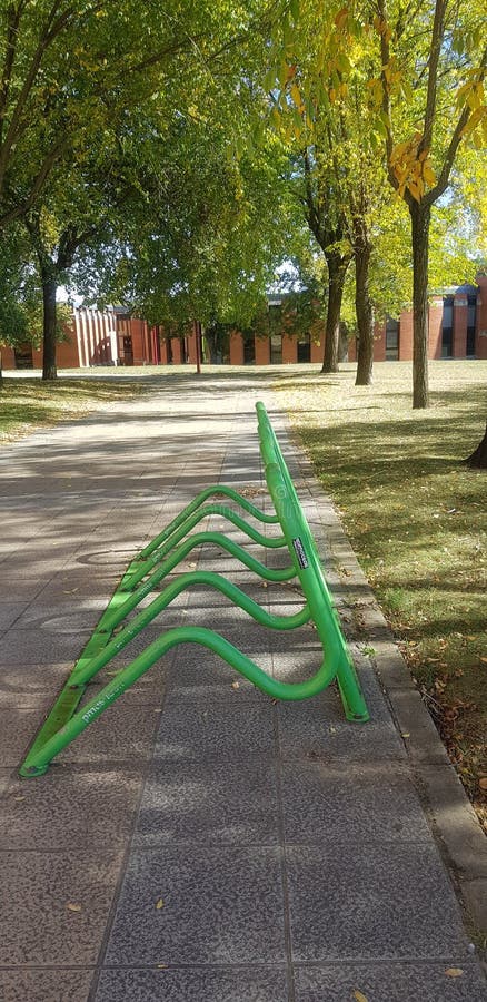 Bicycle Parking Racks in a Park Stock Photo - Image of bike, park ...