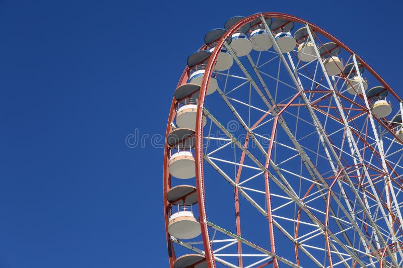 An Empty Big Wheel on a Blue Sky Background Stock Image - Image of ...