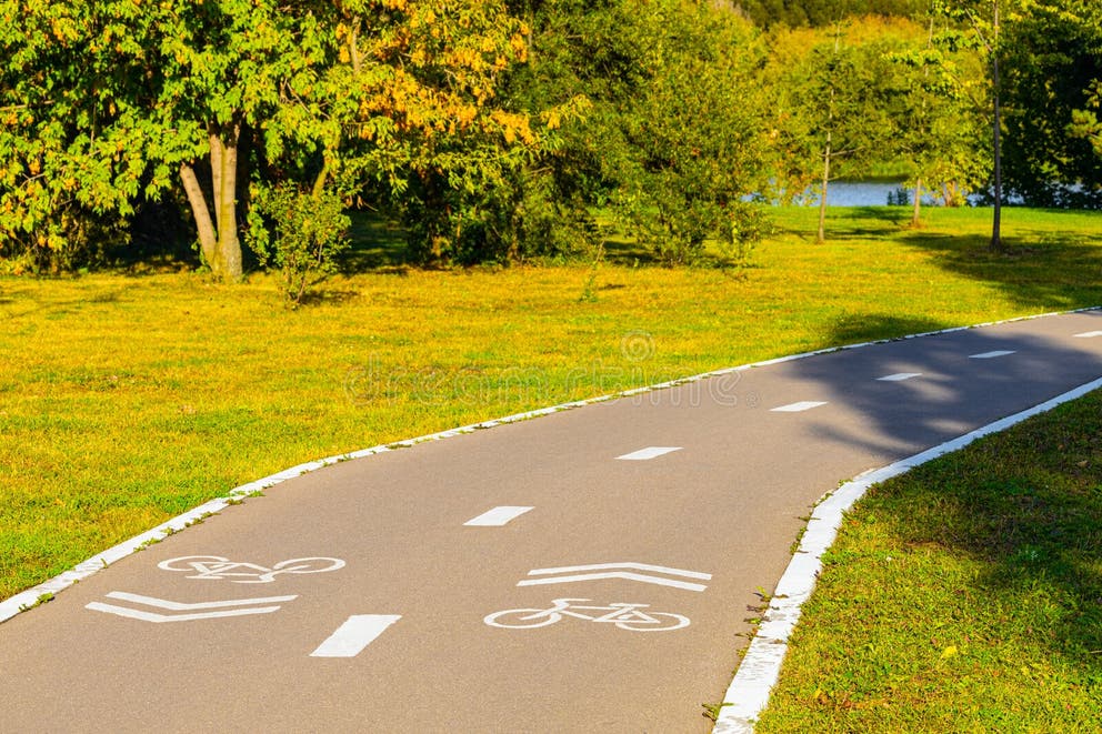 Empty Bike Path with Markings in the Park Stock Image - Image of sign ...