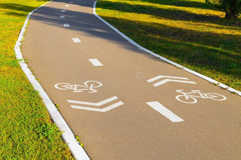 Empty Bike Path with Markings in the Park. Stock Photo - Image of ...