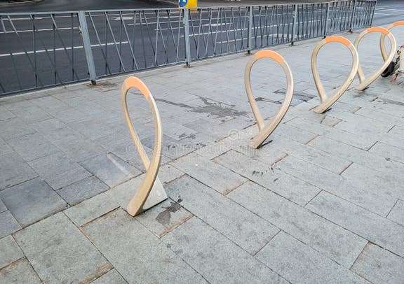 An Empty Bike Rack on the Sidewalk in the City. Stock Image - Image of ...