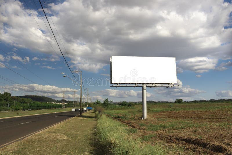 Empty Billboard in Front of Beautiful Cloudy Sky in a Rural Location ...