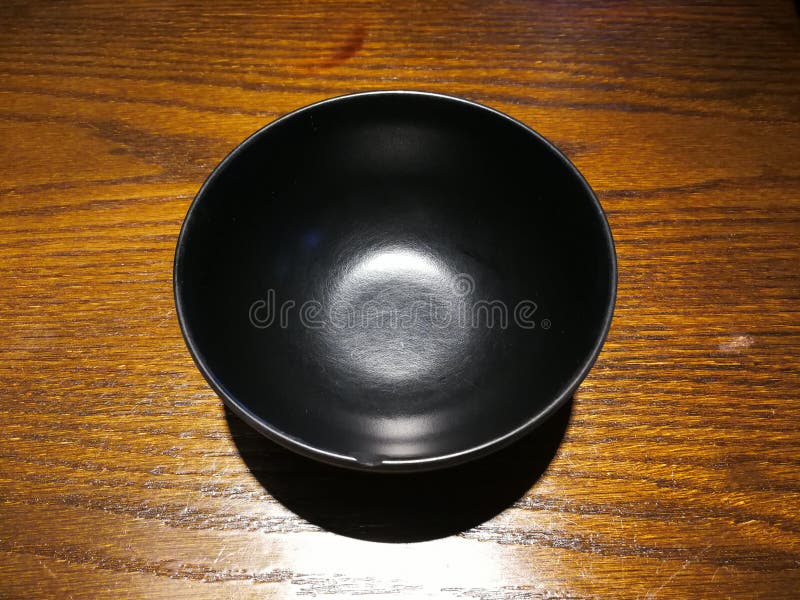 Empty Black Bowl on the Table Stock Image - Image of life, view: 93772003