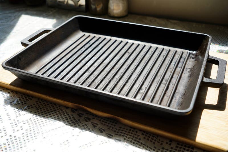 Empty Black Cast Heavy Iron Grill Pan on Modern Kitchen Countertop ...