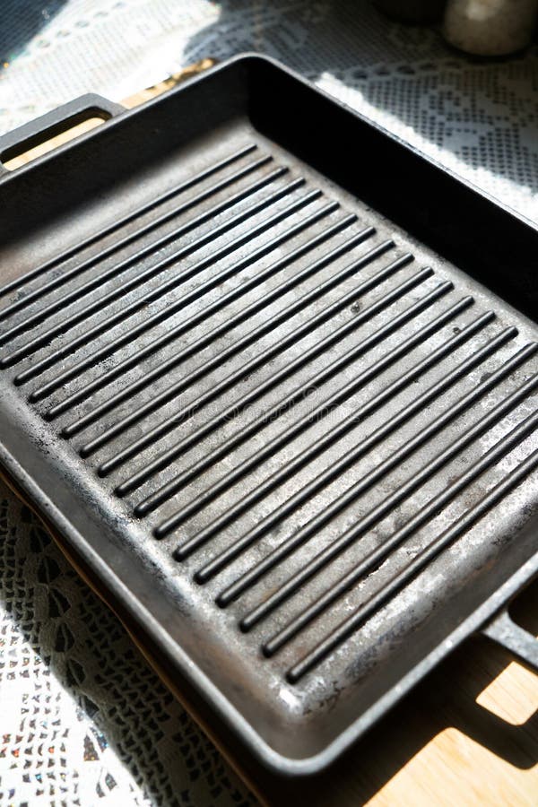 Empty Black Cast Heavy Iron Grill Pan on Modern Kitchen Countertop ...