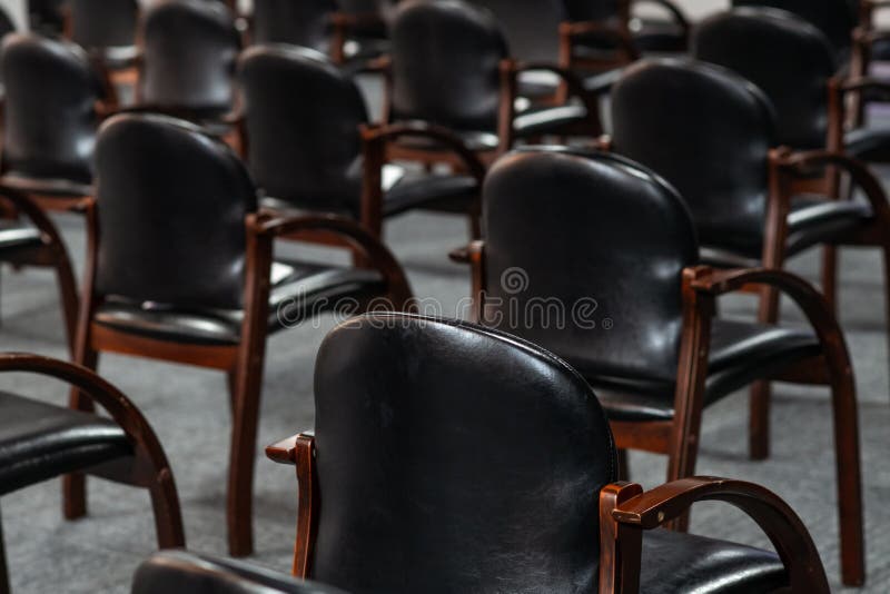Empty Black Chairs Stand in Conference Hall. Stock Photo - Image of ...