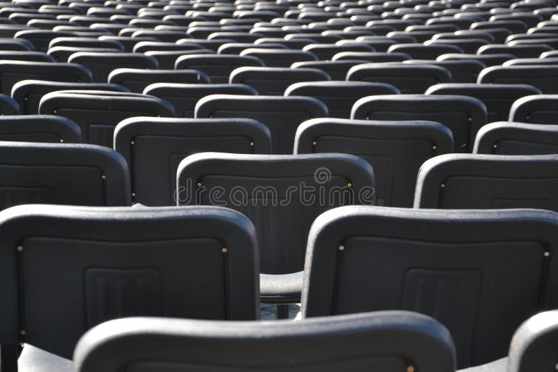 Empty Black Plastic Chairs Alligned in Many Rows Stock Image - Image of ...