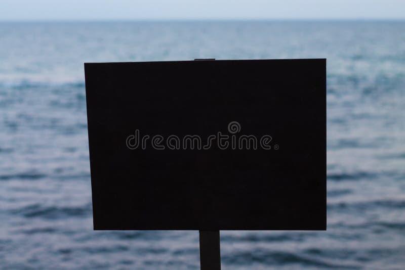 Empty Black Sign with Sea on the Background Stock Image - Image of ...