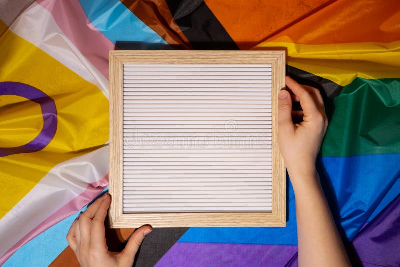 Empty Blank Frame on Rainbow LGBTQIA Flag Made from Silk Material with ...