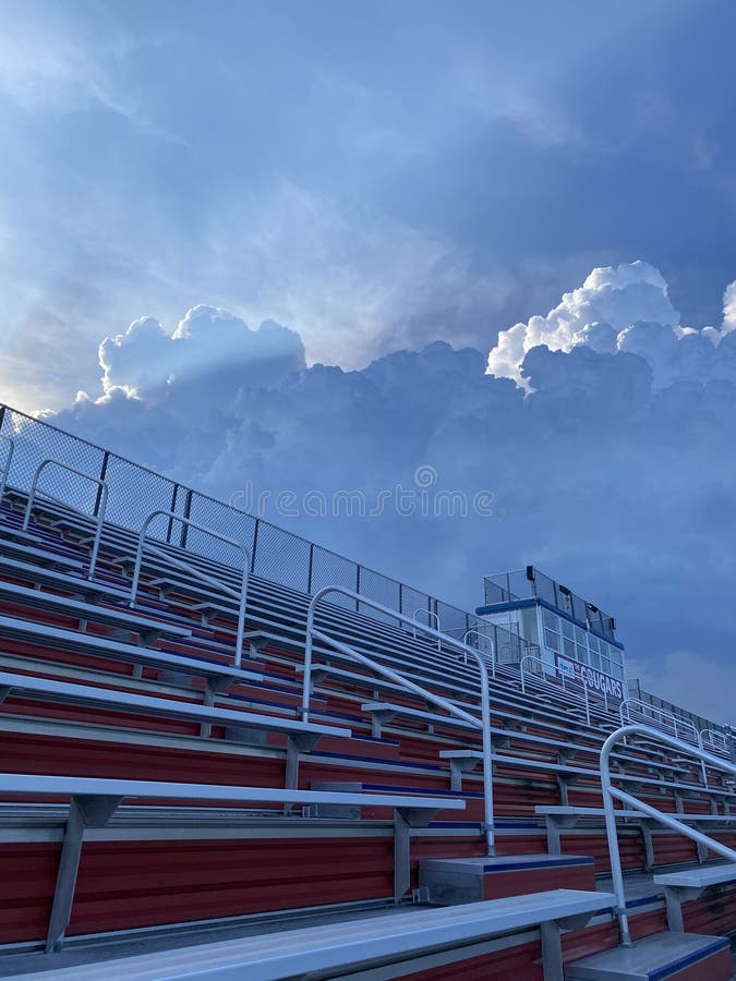 Empty Bleachers Under Cloudy Sky Stock Photo - Image of stadium, bench ...