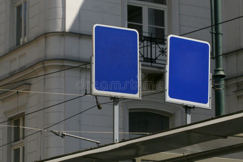 Empty blue bus stop signs, stock image. Image of travel - 96889077