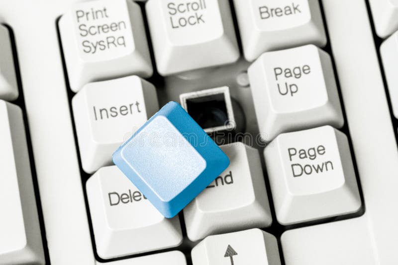 Empty Blue Button Removed from White Computer Keyboard Stock Photo ...