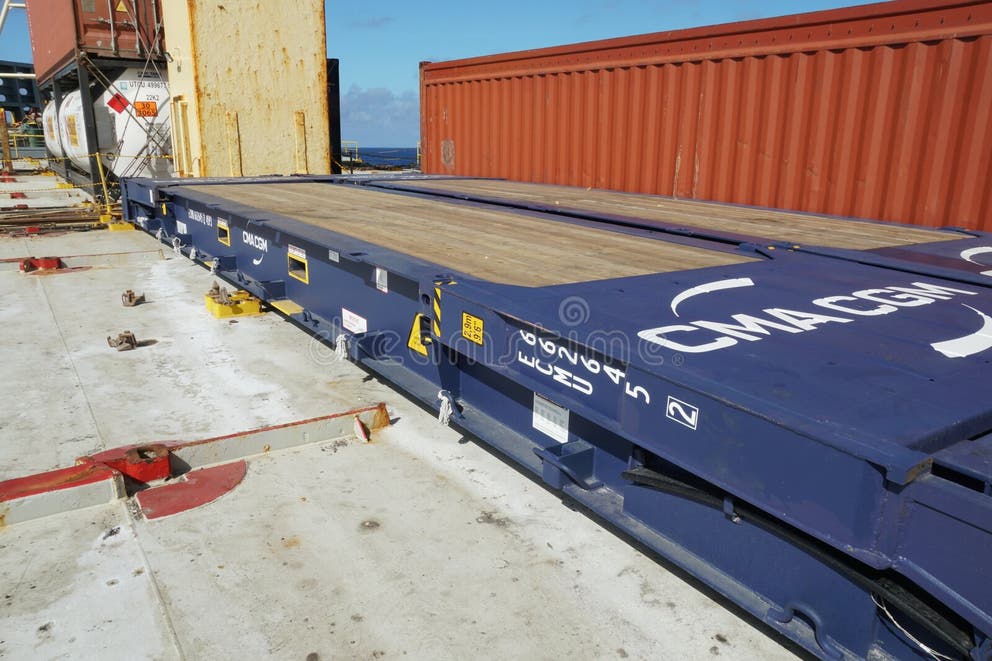 Empty Blue Flat Rack Container Secured on Deck of Container Vessel ...