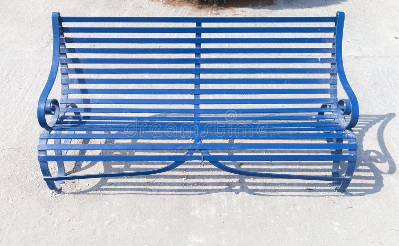 Empty Blue Metal Bench Standing on Concrete Floor Stock Image - Image ...