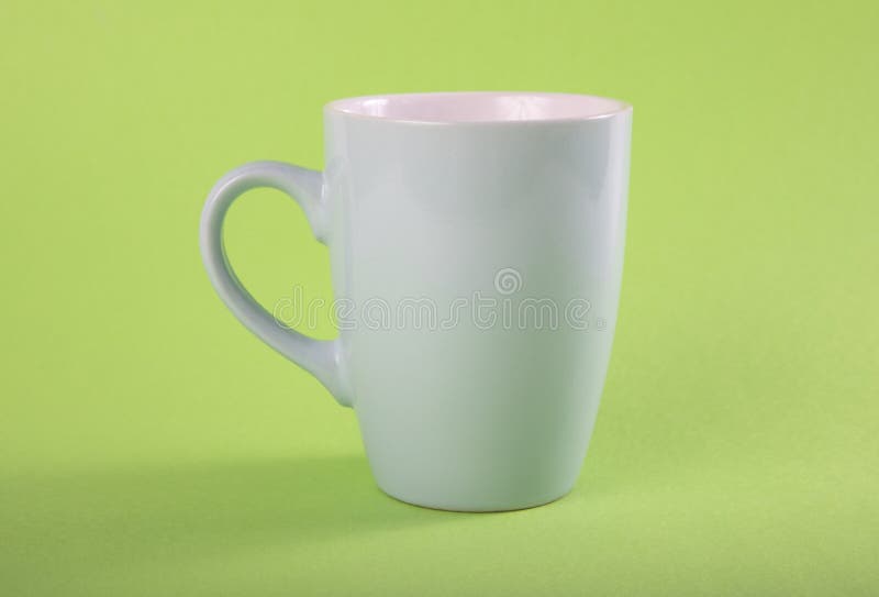 Empty Blue Mug on a Green Background. Stock Photo - Image of ceramic ...