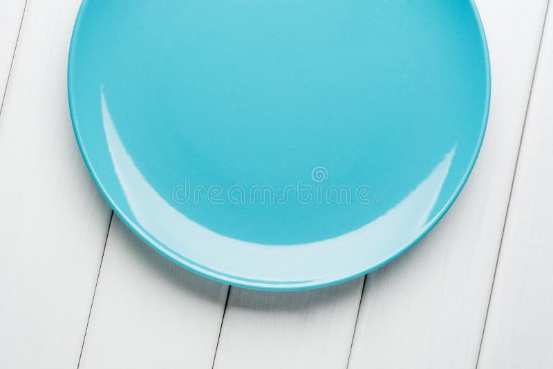 Empty Blue Plate on White Plank Background Stock Image - Image of ...