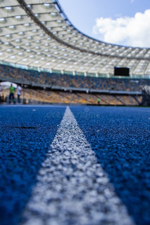 Empty Blue Running Track at the Olympic Stadium Stock Image - Image of ...
