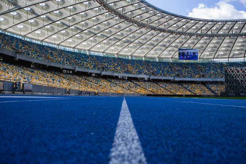 Empty Blue Running Track at the Olympic Stadium Stock Photo - Image of ...