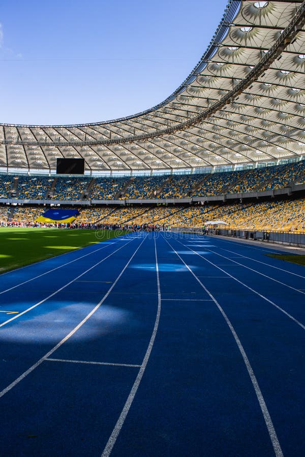 Empty Blue Running Track at the Olympic Stadium Stock Image - Image of ...
