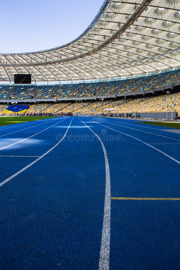 Empty Blue Running Track at the Olympic Stadium Stock Photo - Image of ...