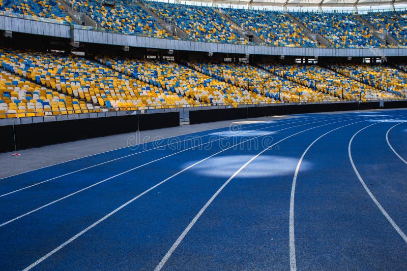 Empty Blue Running Track at the Olympic Stadium Stock Image - Image of ...