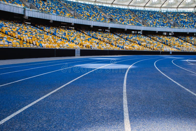 Empty Blue Running Track at the Olympic Stadium Stock Image - Image of ...