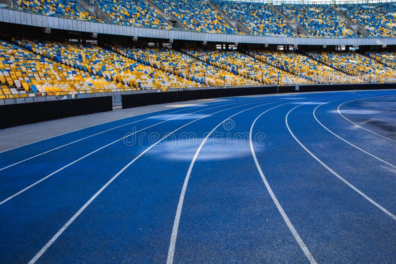 Empty Blue Running Track at the Olympic Stadium Stock Image - Image of ...